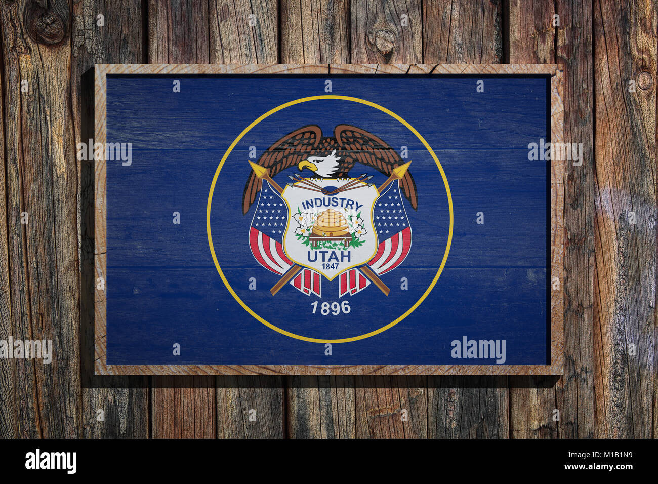 3d rendering of an Utah State USA flag on a wooden frame and a wood ...