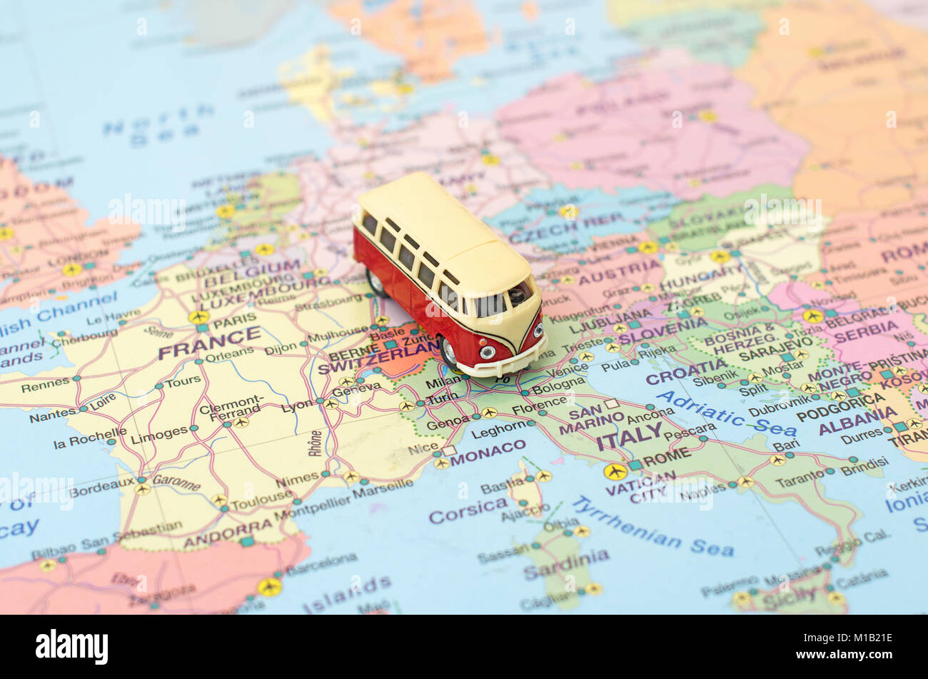 Concept of Europe car trip. Car is on the map in Italy Stock Photo - Alamy