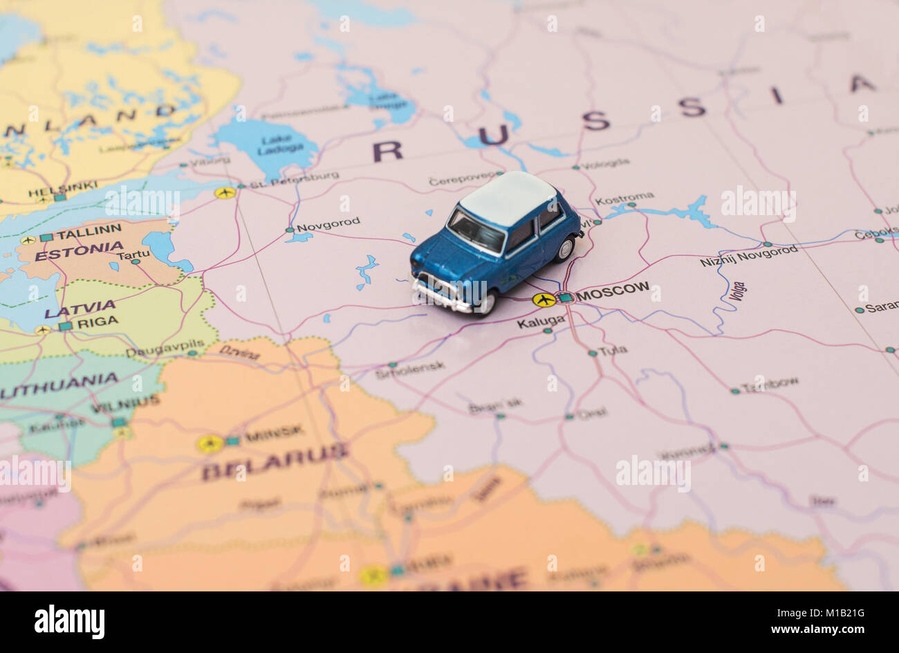 Concept of Europe car trip. Car is on the map in Russia Stock Photo - Alamy