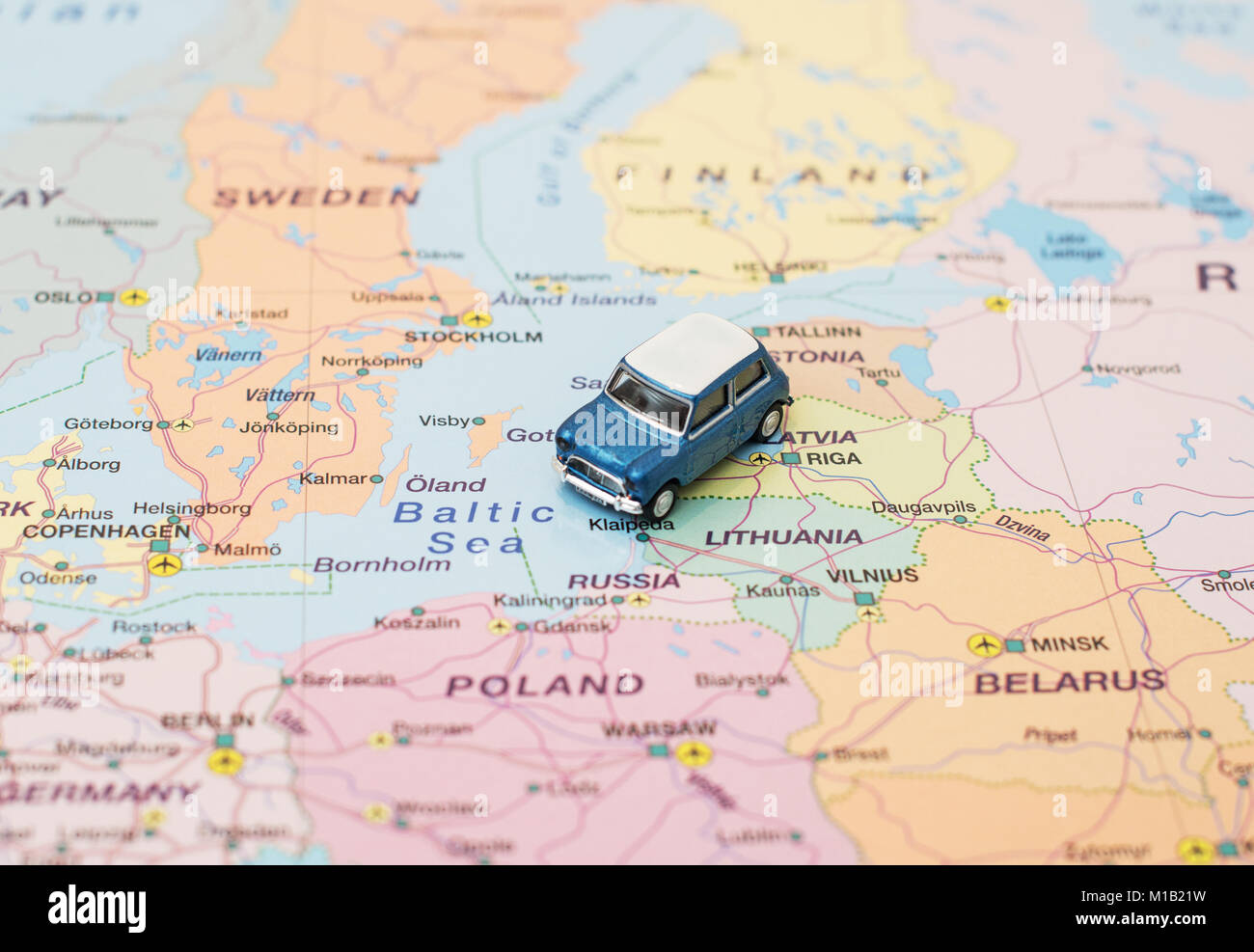 Concept of Europe car trip. Car is on the map in Baltic States Stock ...