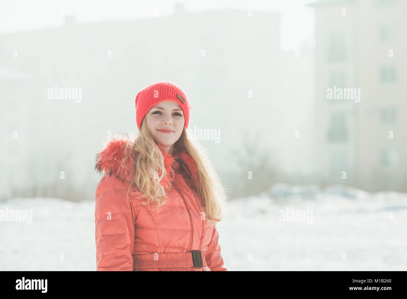 Girl in red parka Stock Photo - Alamy