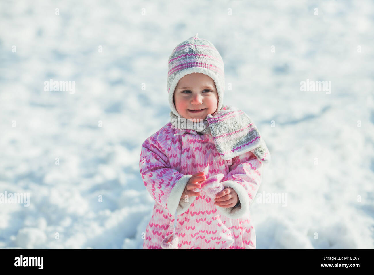 Girl enjoys the snow Stock Photo - Alamy