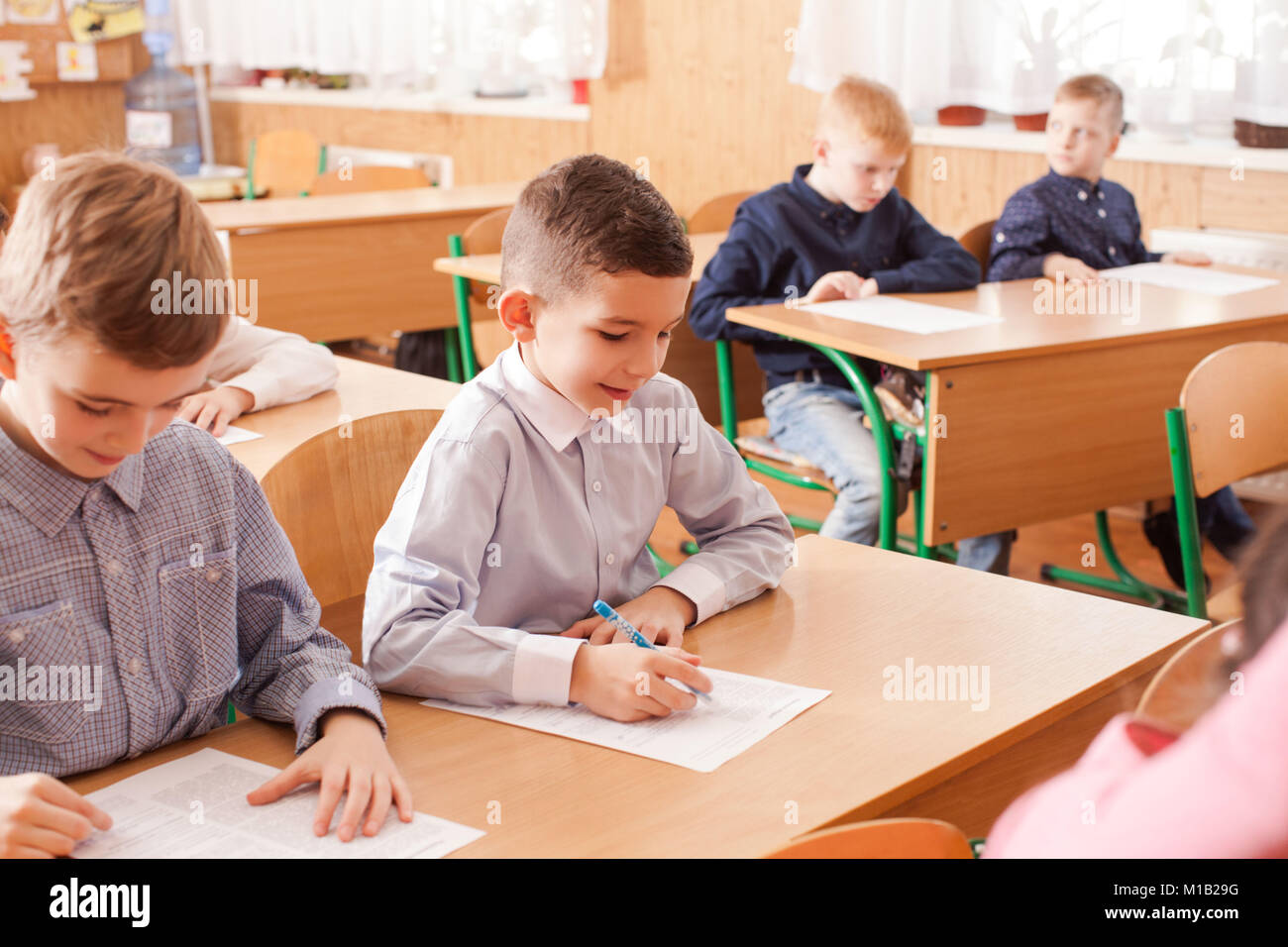 Children taking an exam Stock Photo - Alamy