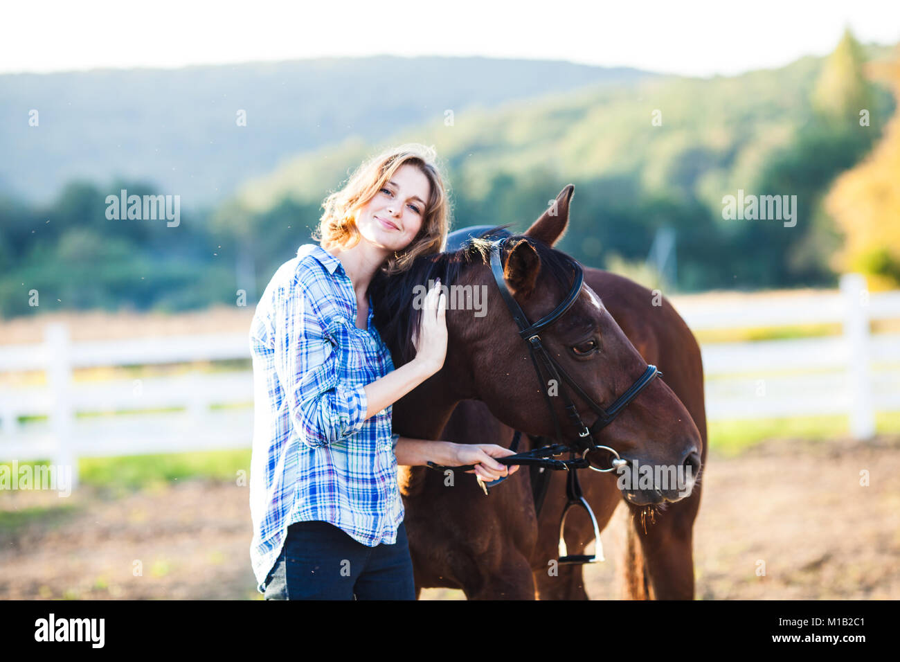 Beautiful girl with horse Stock Photo - Alamy