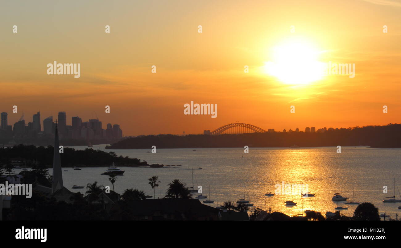 Sunset in Sydney with skyline Stock Photo - Alamy