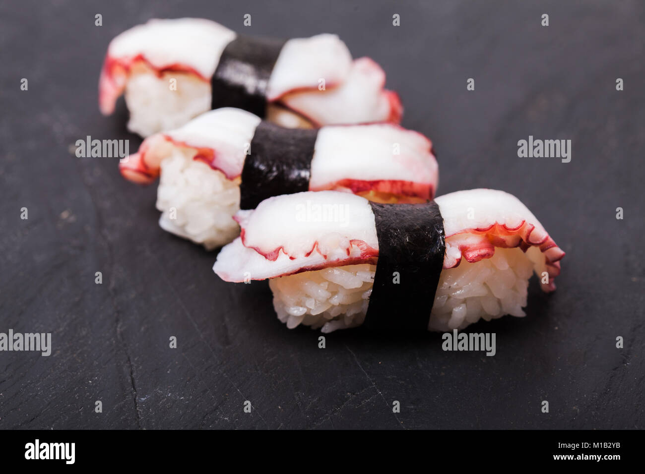 Tako nigiri sushi Stock Photo - Alamy