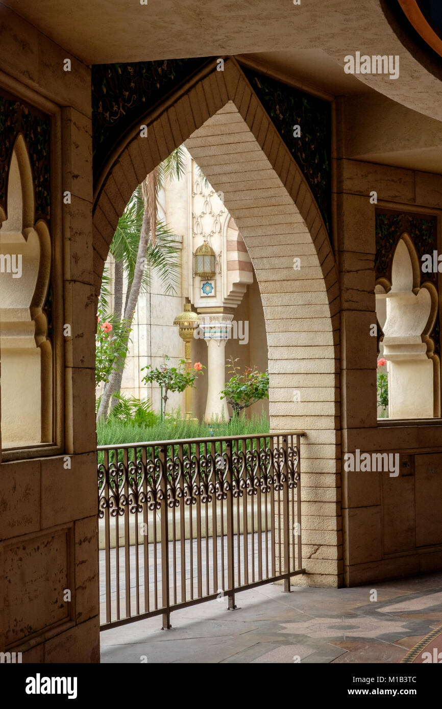 Arabic architecture with arched doorway and shaped windows. At Arabian ...