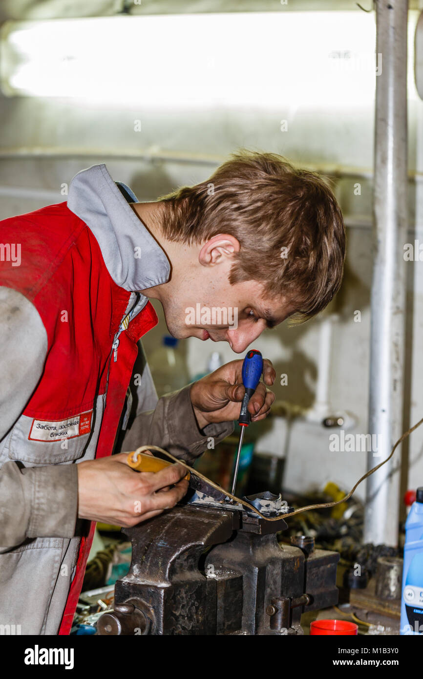 Service-man at work Stock Photo - Alamy