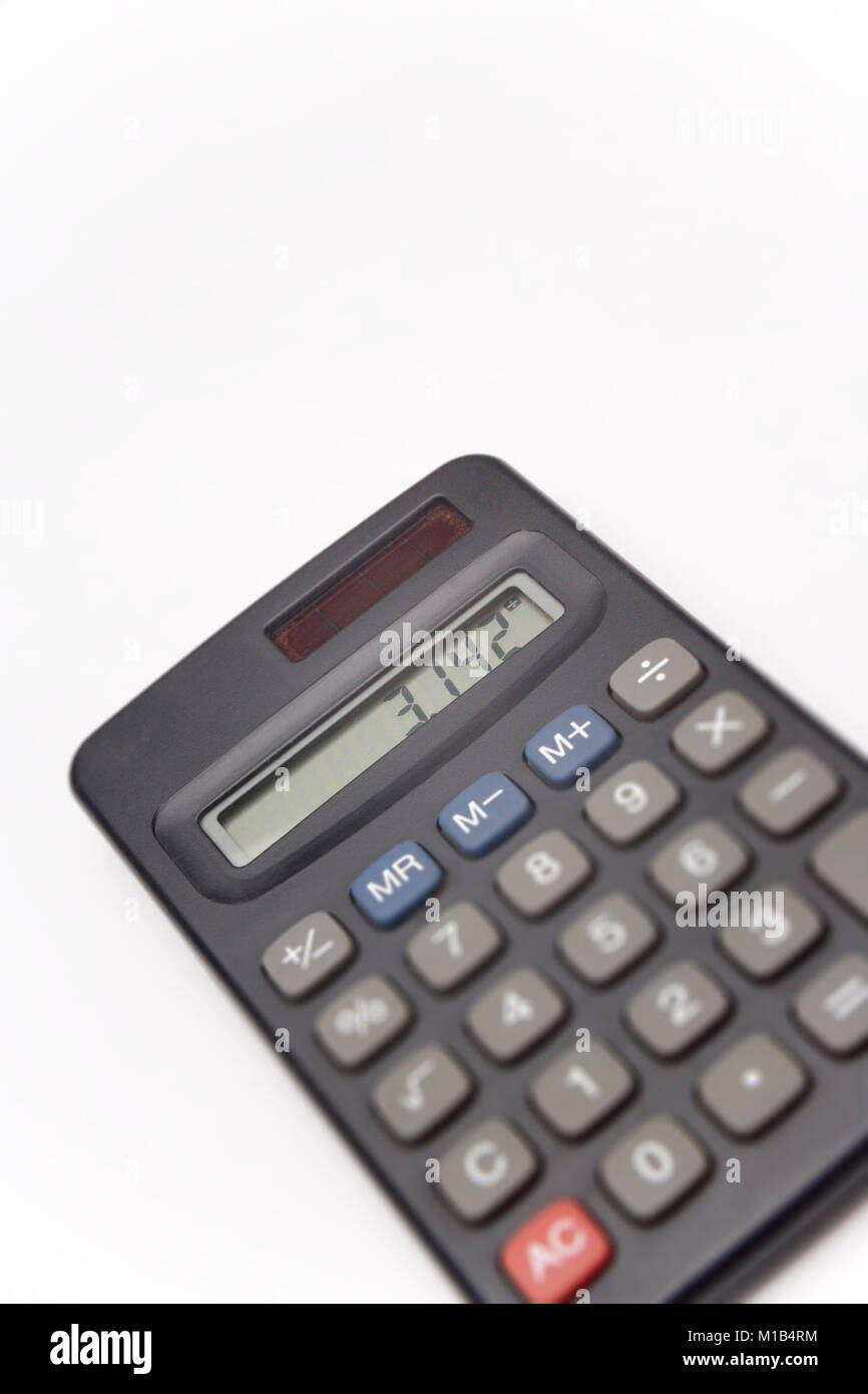 Calculator on white background showing value of pi, unsharp keyboard ...