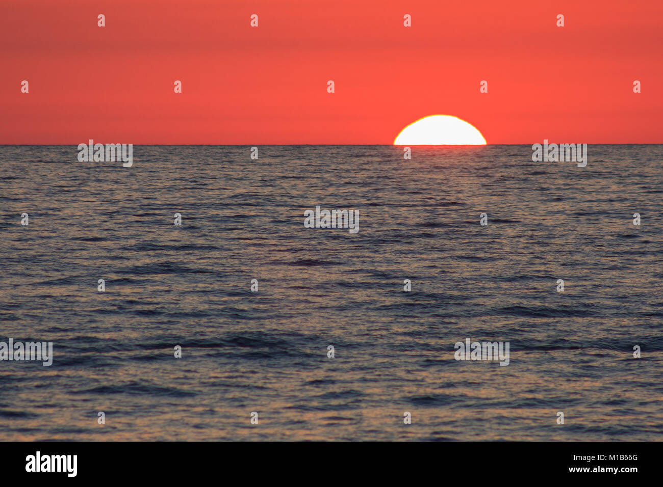 Sunset on the sea Stock Photo - Alamy