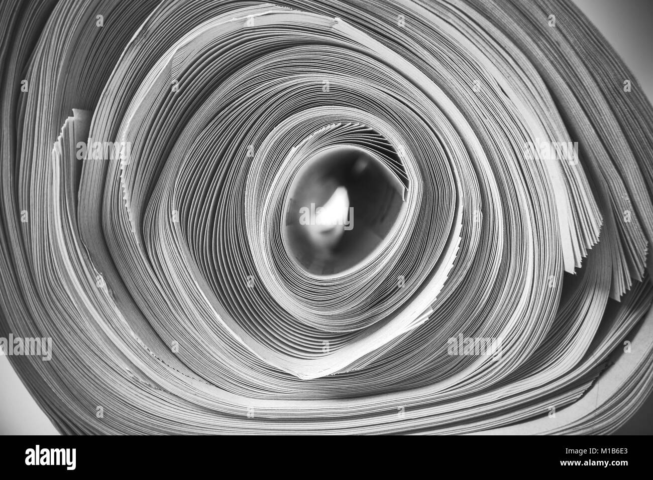 Closeup view of newspapers roll Stock Photo - Alamy