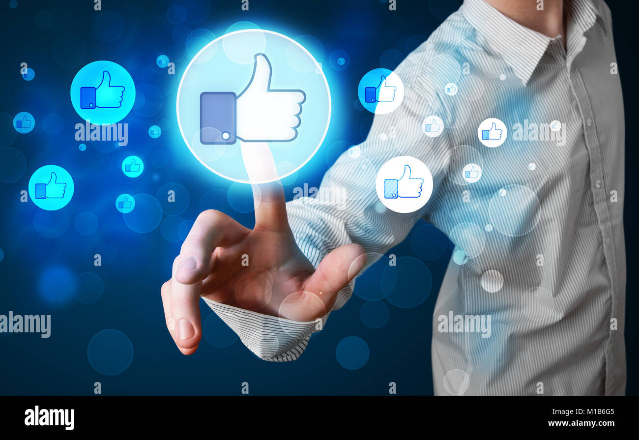 Pressing thumbs hi-res stock photography and images - Alamy