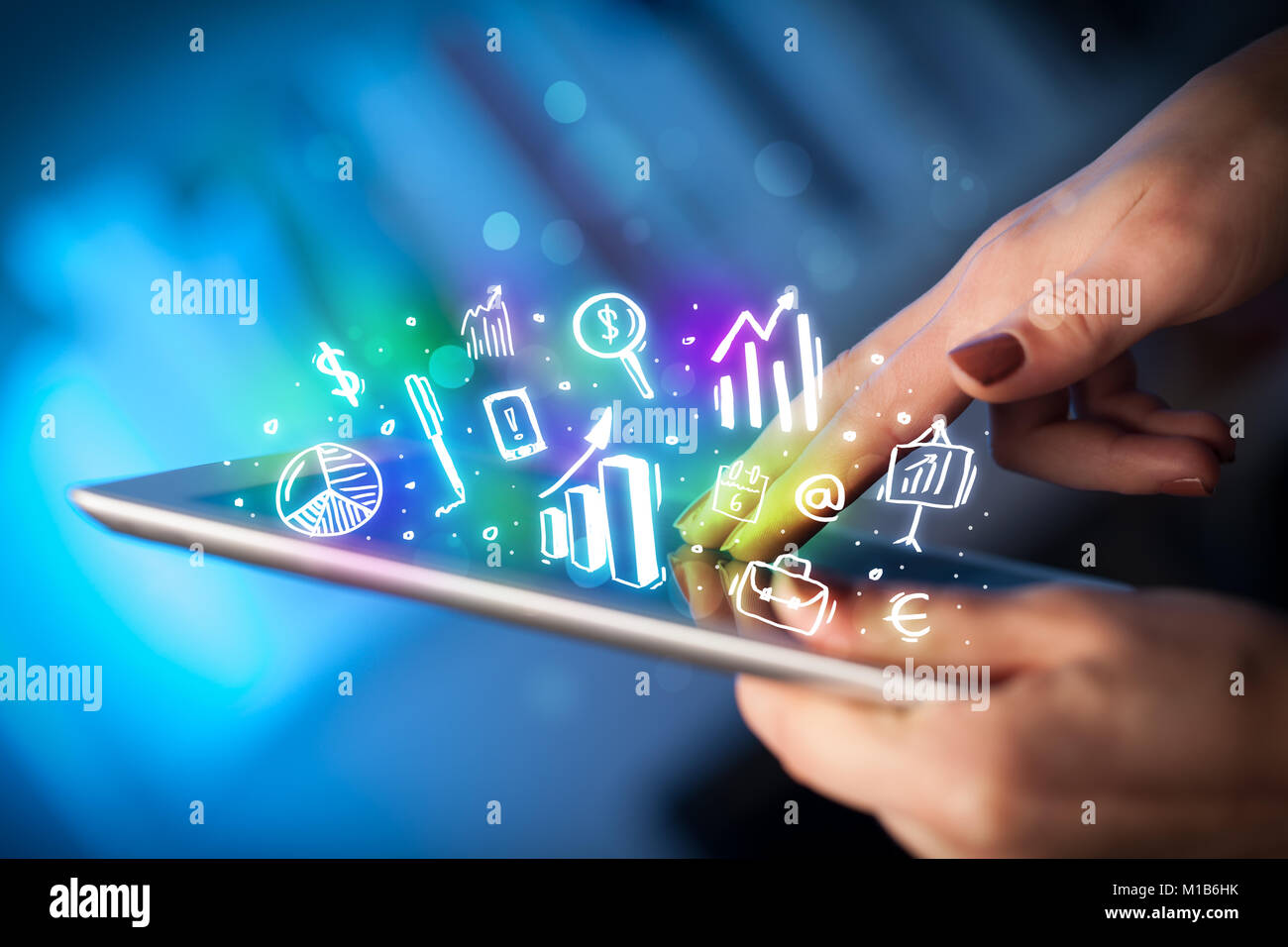 Finger pointing on tablet pc, charts concept Stock Photo - Alamy