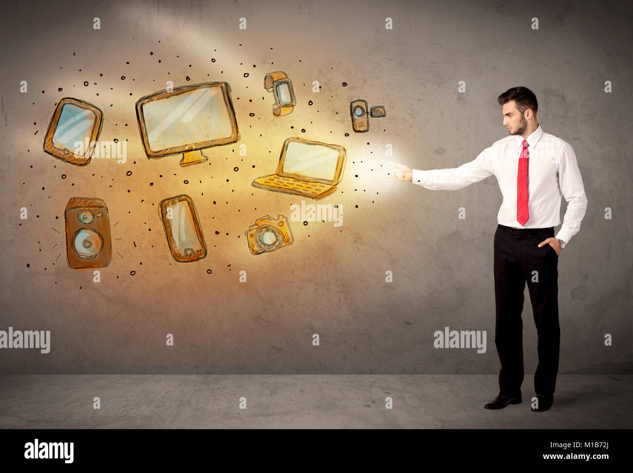 Man throwing hand drawn electronical devices concept Stock Photo - Alamy
