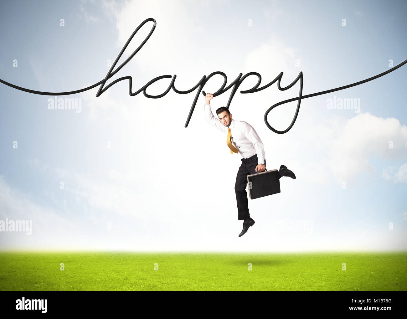 Businessman hanging on a happy rope Stock Photo - Alamy