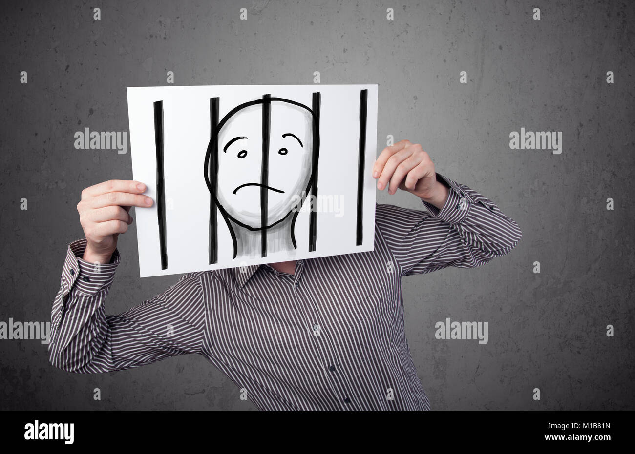 Prisoner standing behind prison cell hi-res stock photography and ...