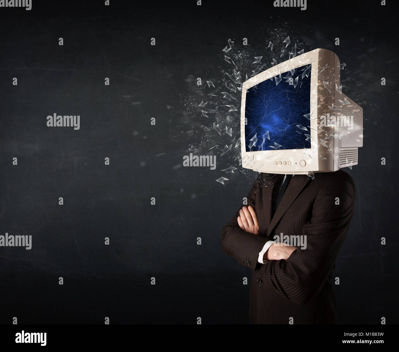 Computer monitor screen exploding on a young persons head concept Stock ...