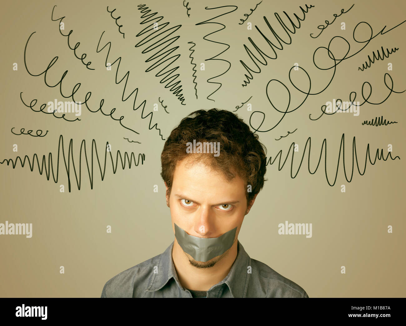 Young man with taped mouth and curly lines around his head Stock Photo ...