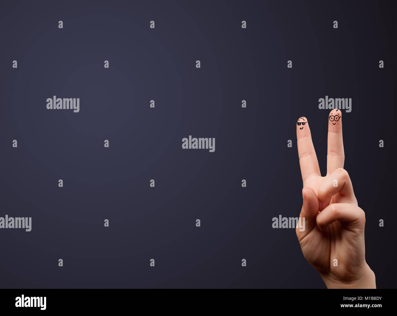 Happy cheerful smiley fingers looking at empty wall copyspace Stock ...