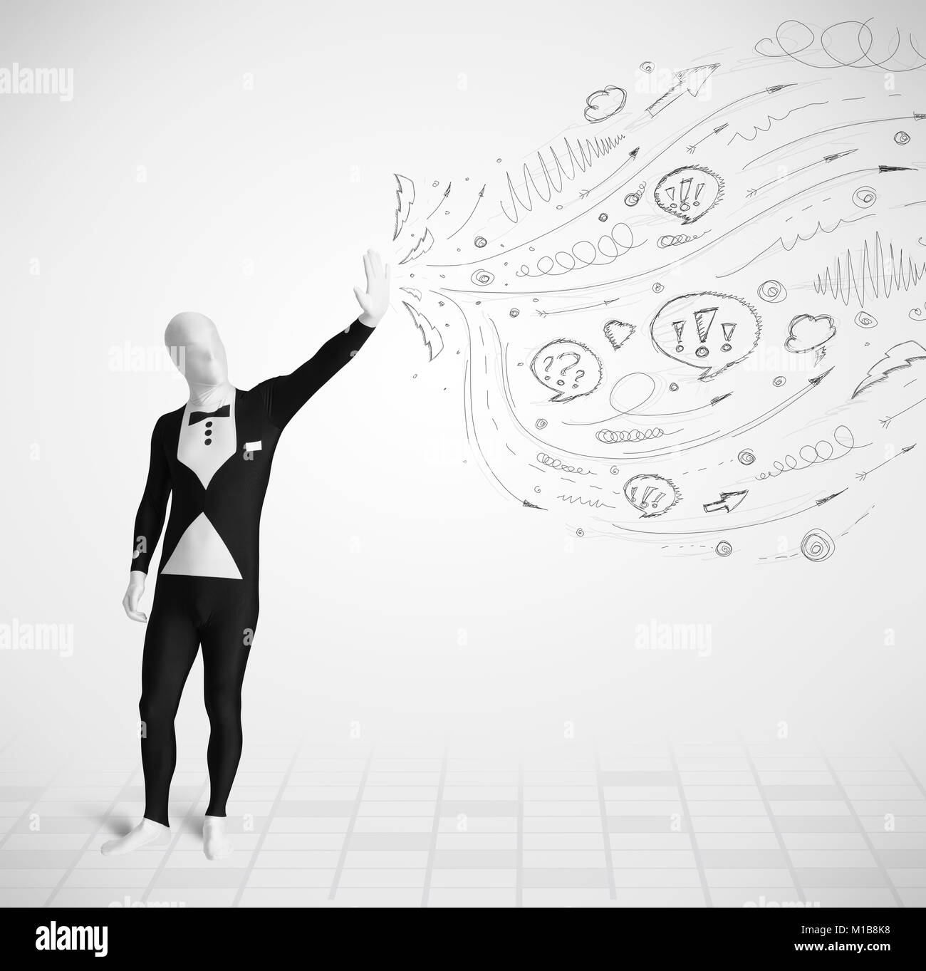 Funny guy in body suit morphsuit looking at sketches and doodles Stock ...