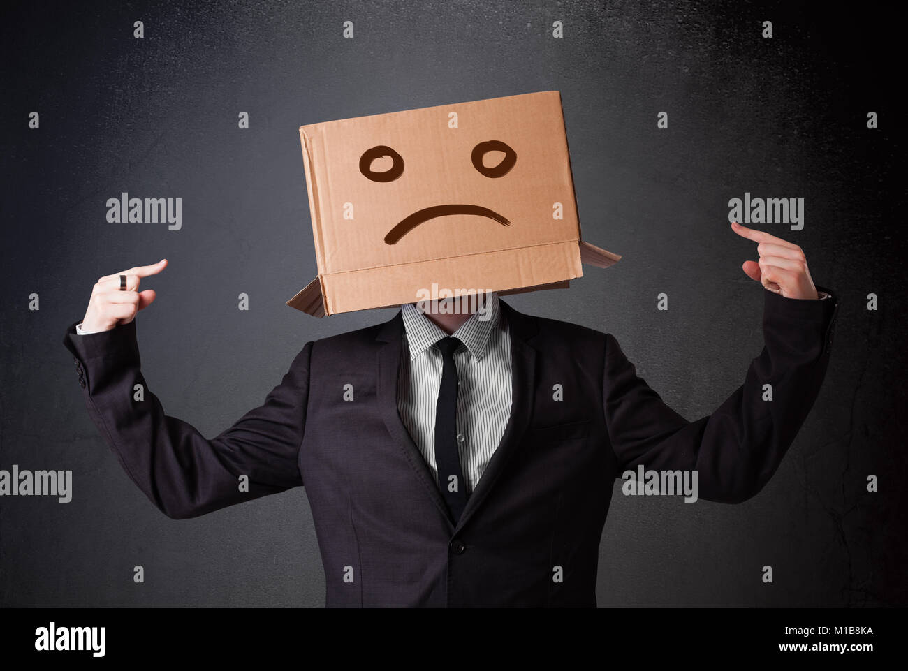 Businessman cardboard box mask hi-res stock photography and images - Alamy