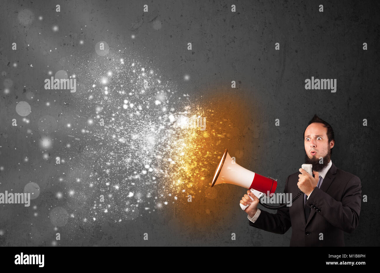 Guy shouting into megaphone and glowing energy particles explode ...