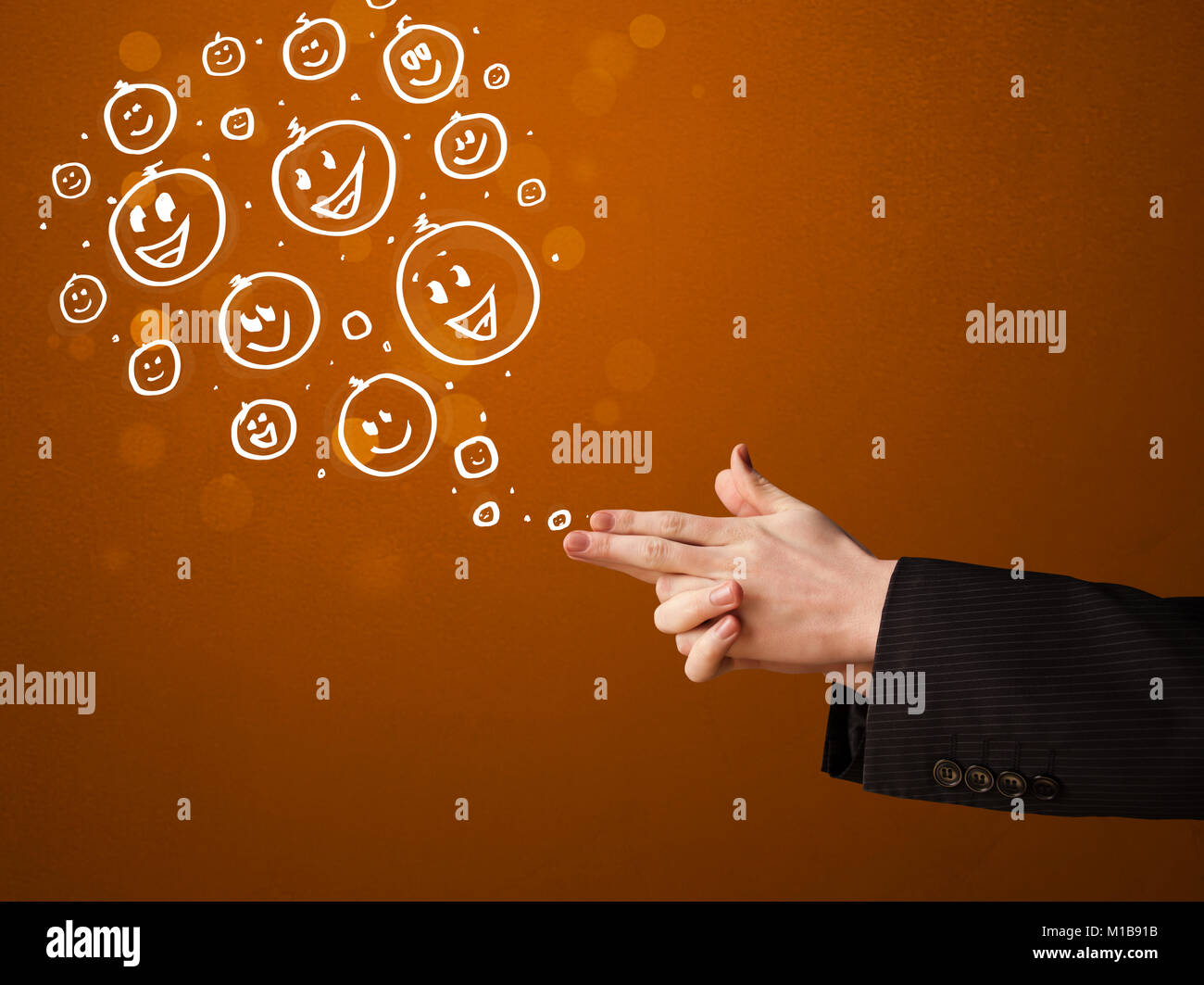 Group of happy hand drawed smiley faces coming out of gun shaped hands ...