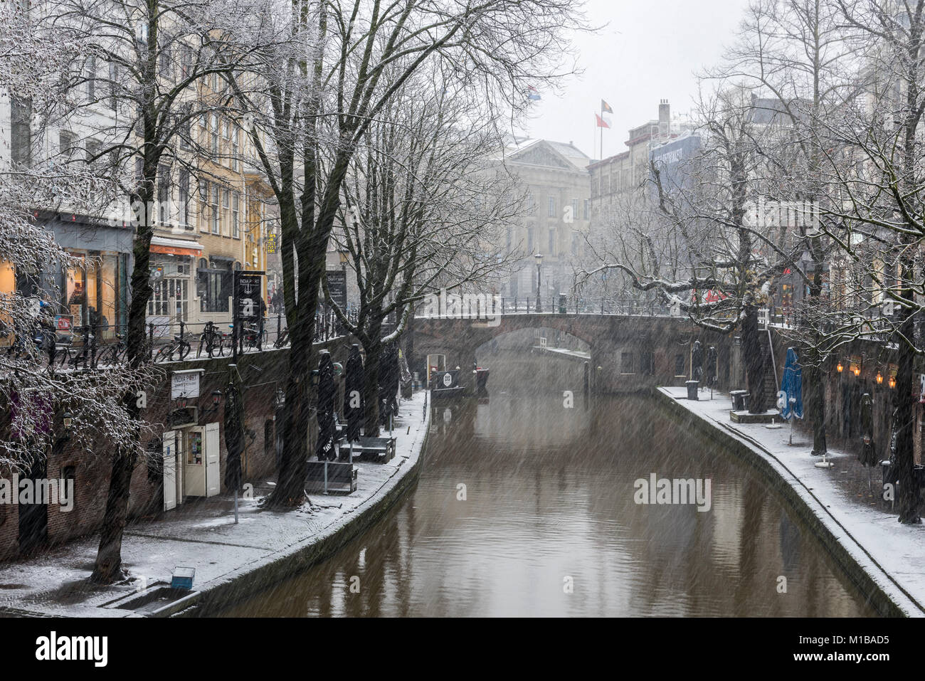 Utrecht, Netherlands - December 11, 2017: canals with trees, shops and ...
