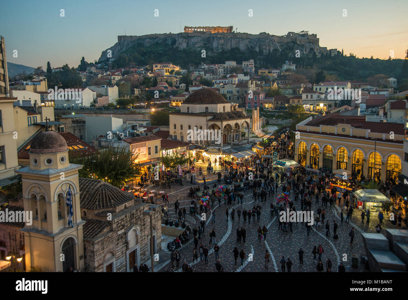 Plaka and ancient Acropolis at twilight in Athens Greece Stock Photo ...