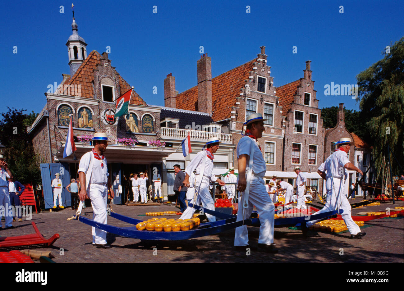 The Netherlands. Edam. Cheese market. After inspection porters bring ...