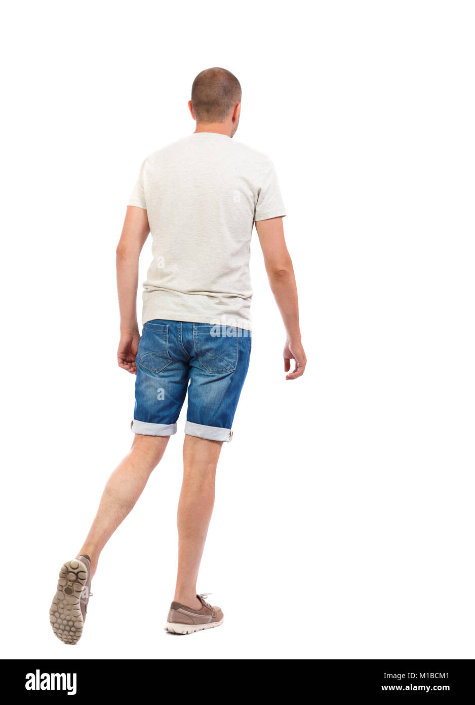 Back view of going handsome man. walking young guy . Rear view people ...