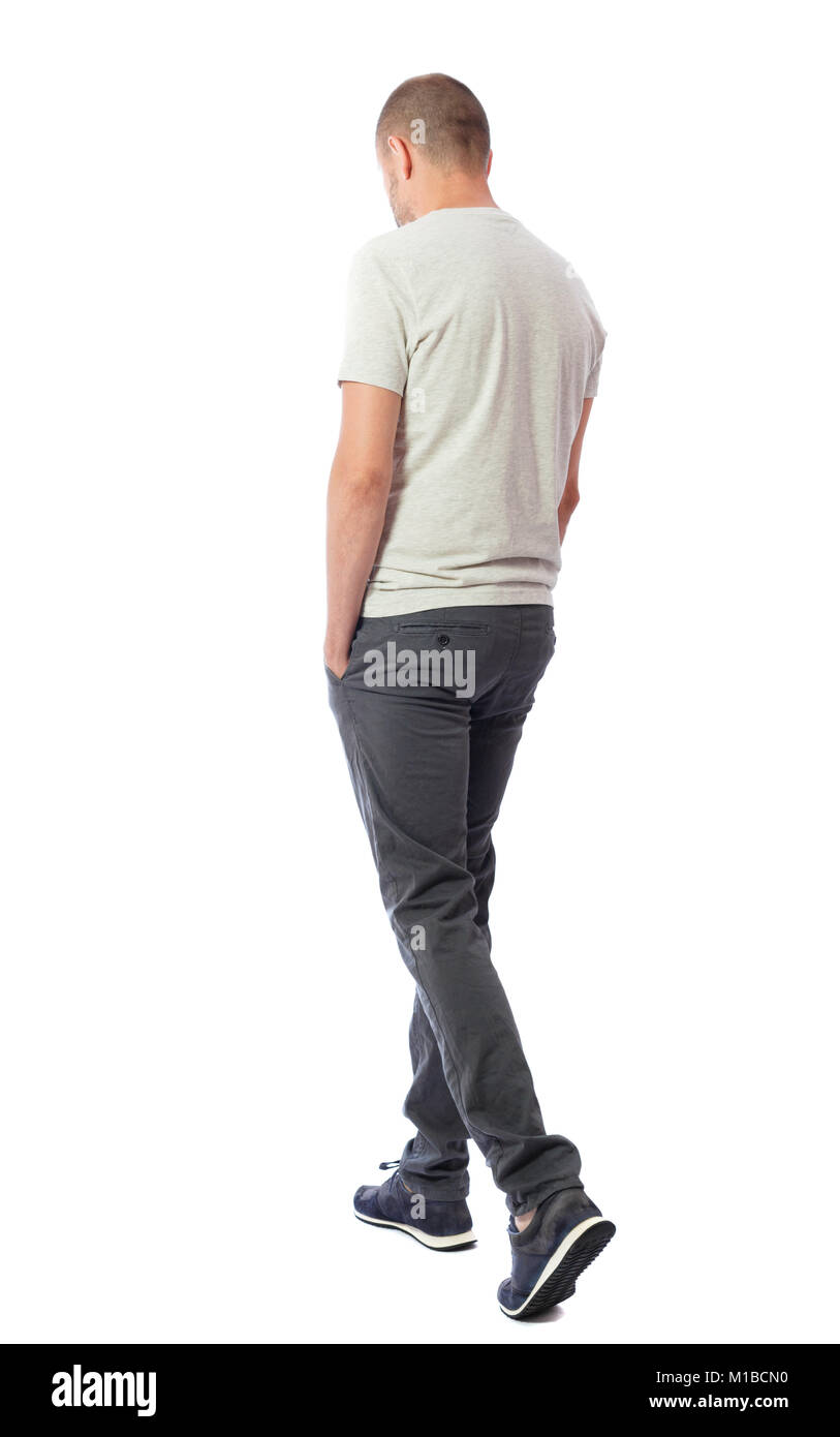 Back view of going handsome man. walking young guy . Rear view people ...