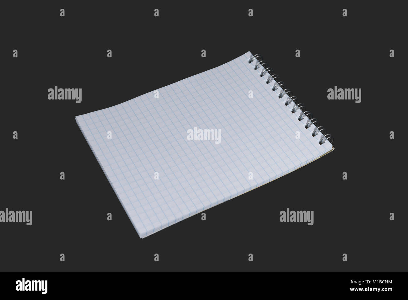 Notepad sheet. Isolated on a black background Stock Photo - Alamy