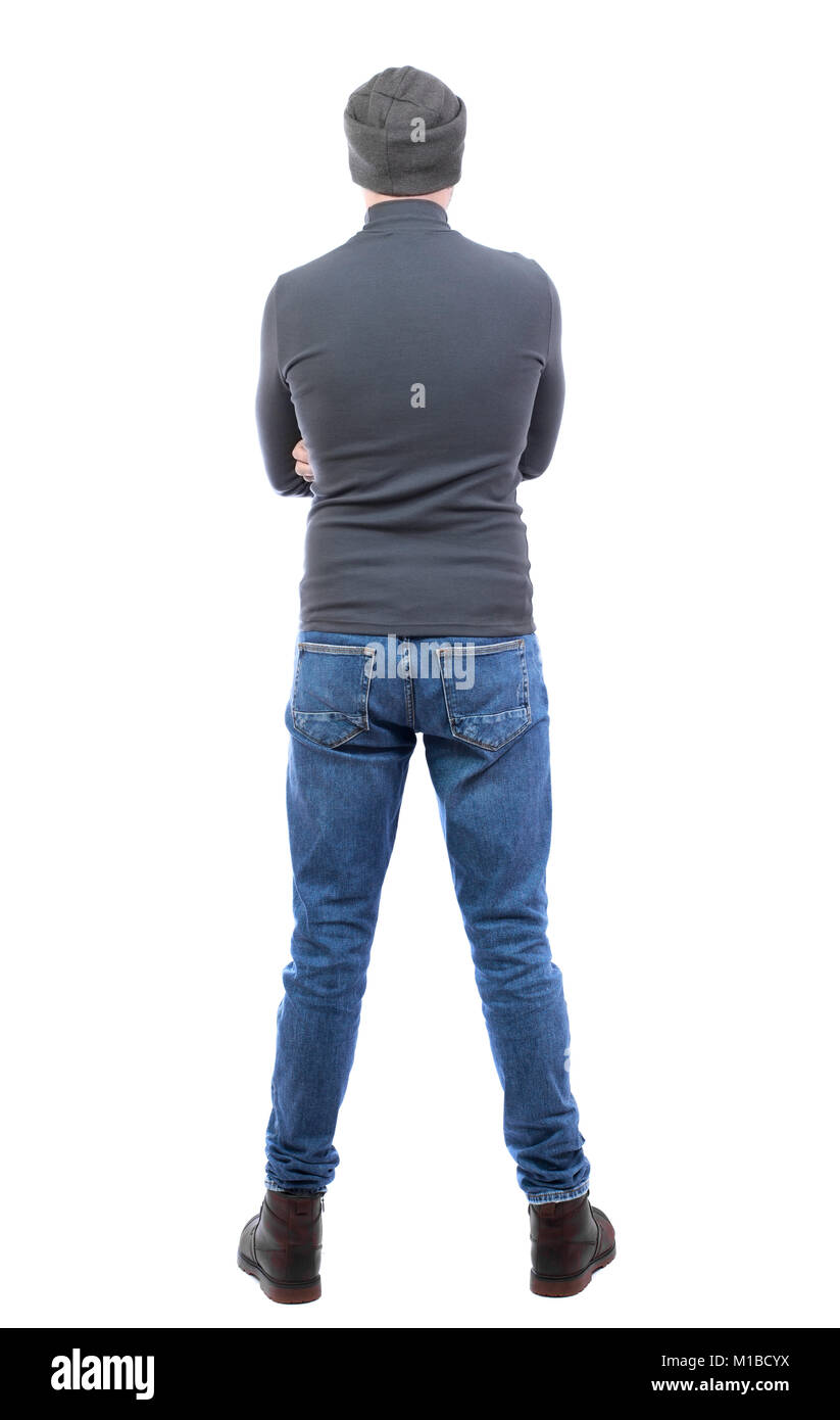 Back view of man in jeans. Standing young guy. Rear view people ...
