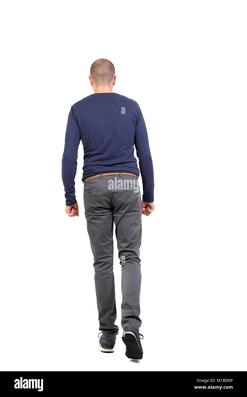 Back view of going handsome man. walking young guy . Rear view people ...