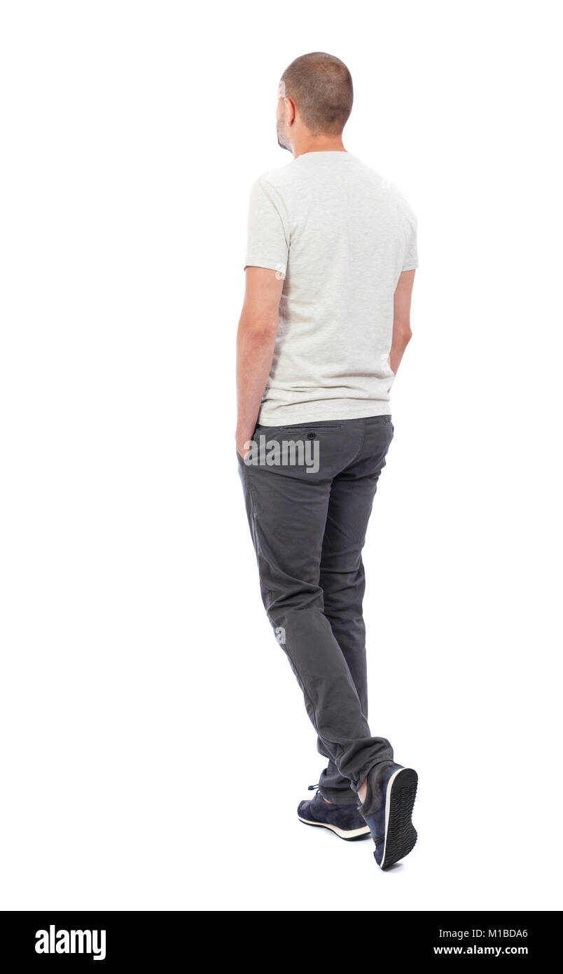Back view of going handsome man. walking young guy . Rear view people ...