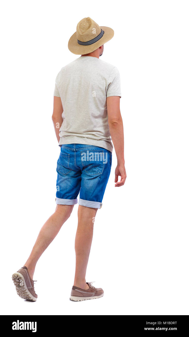 Back view of going handsome man. walking young guy . Rear view people ...