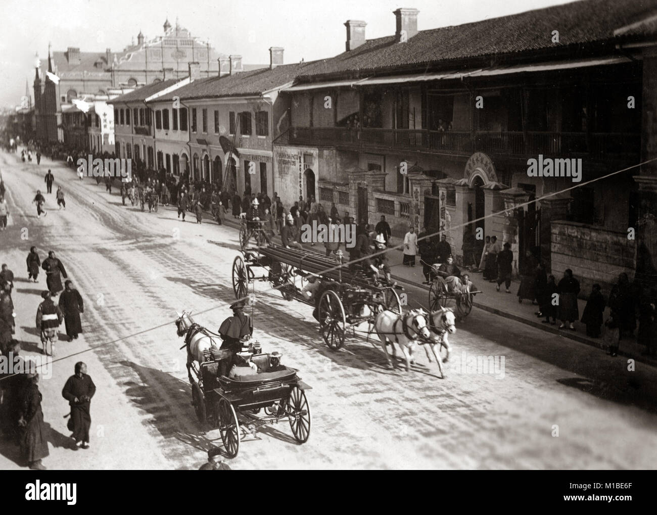 Firemen and horse-drawn ladder, Shanghai, China c.1890 Stock Photo - Alamy