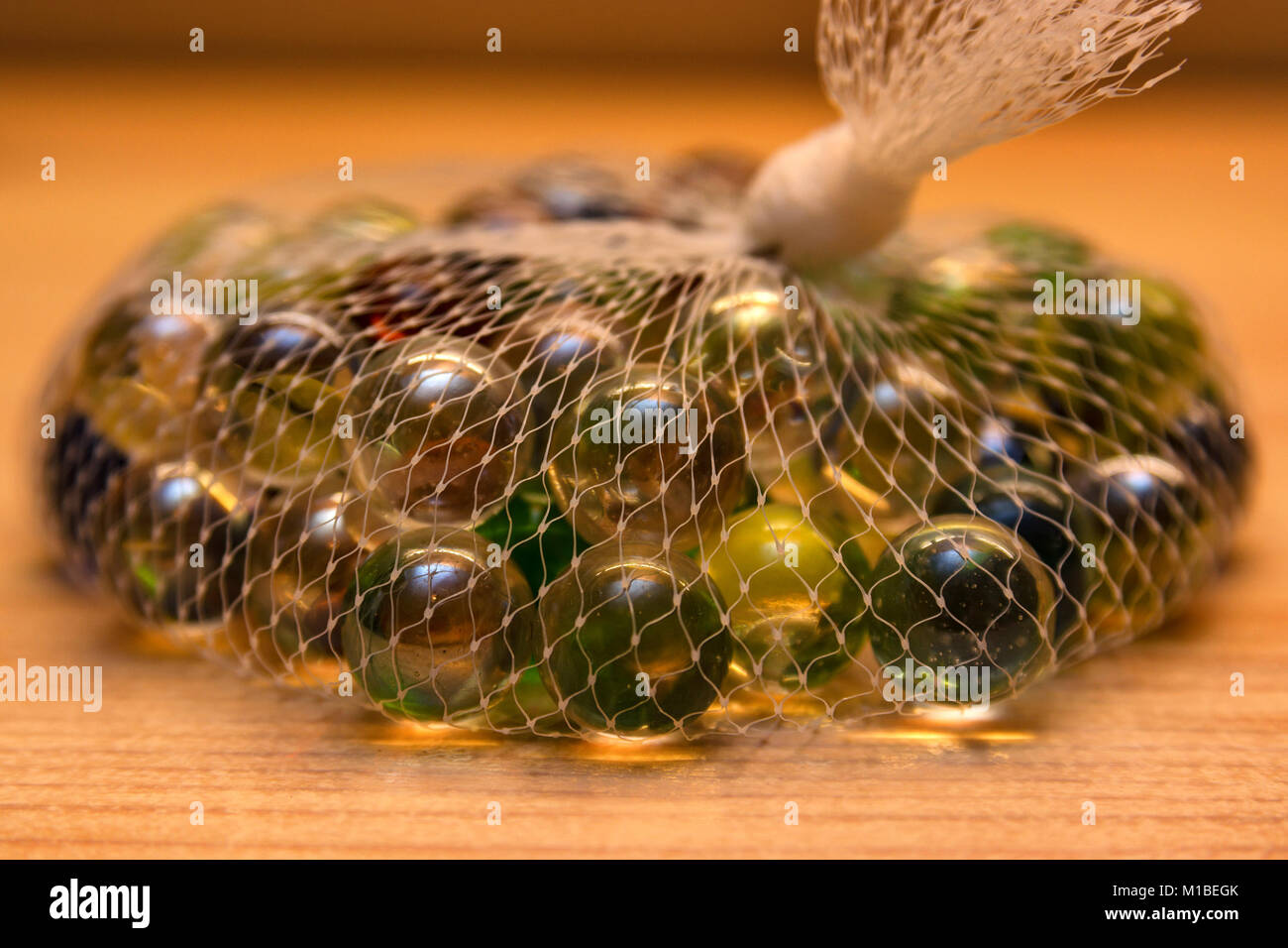 Close up beautiful decorative glass balls in white net Stock Photo - Alamy