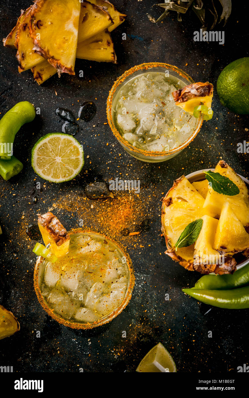Mexican beverage, spicy margarita cocktail with pineapple and jalapeno ...