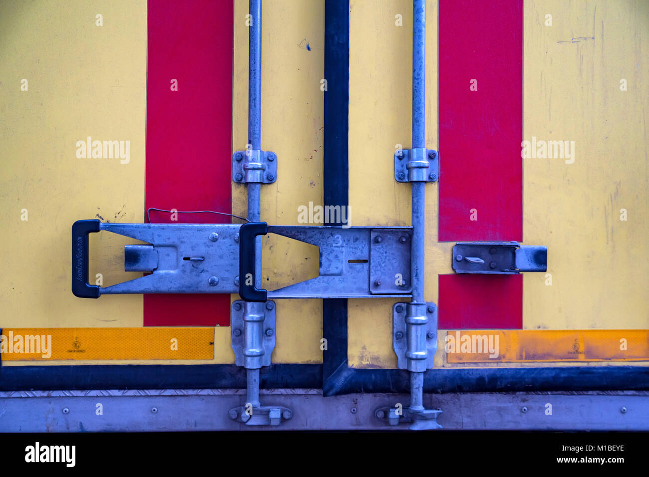 Close up colorful back doors of truck with latch to close them Stock ...