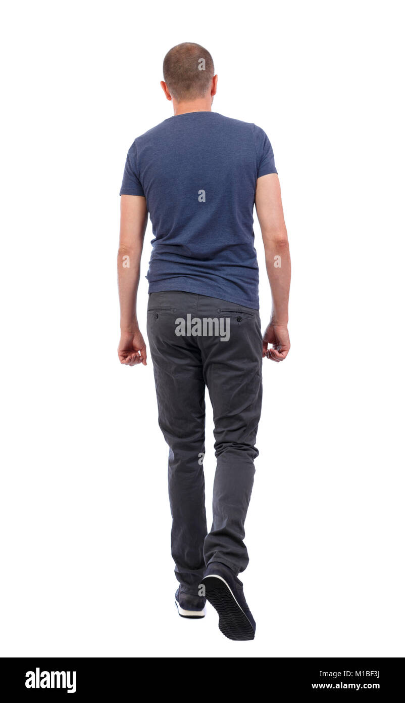 Back view of going handsome man. walking young guy . Rear view people ...