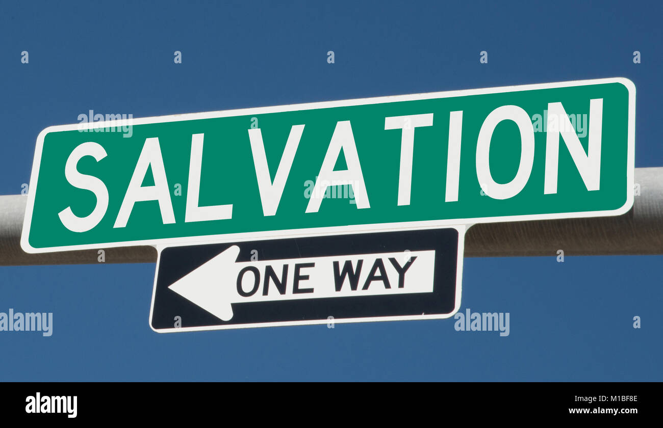 Salvation One Way green highway sign Stock Photo - Alamy