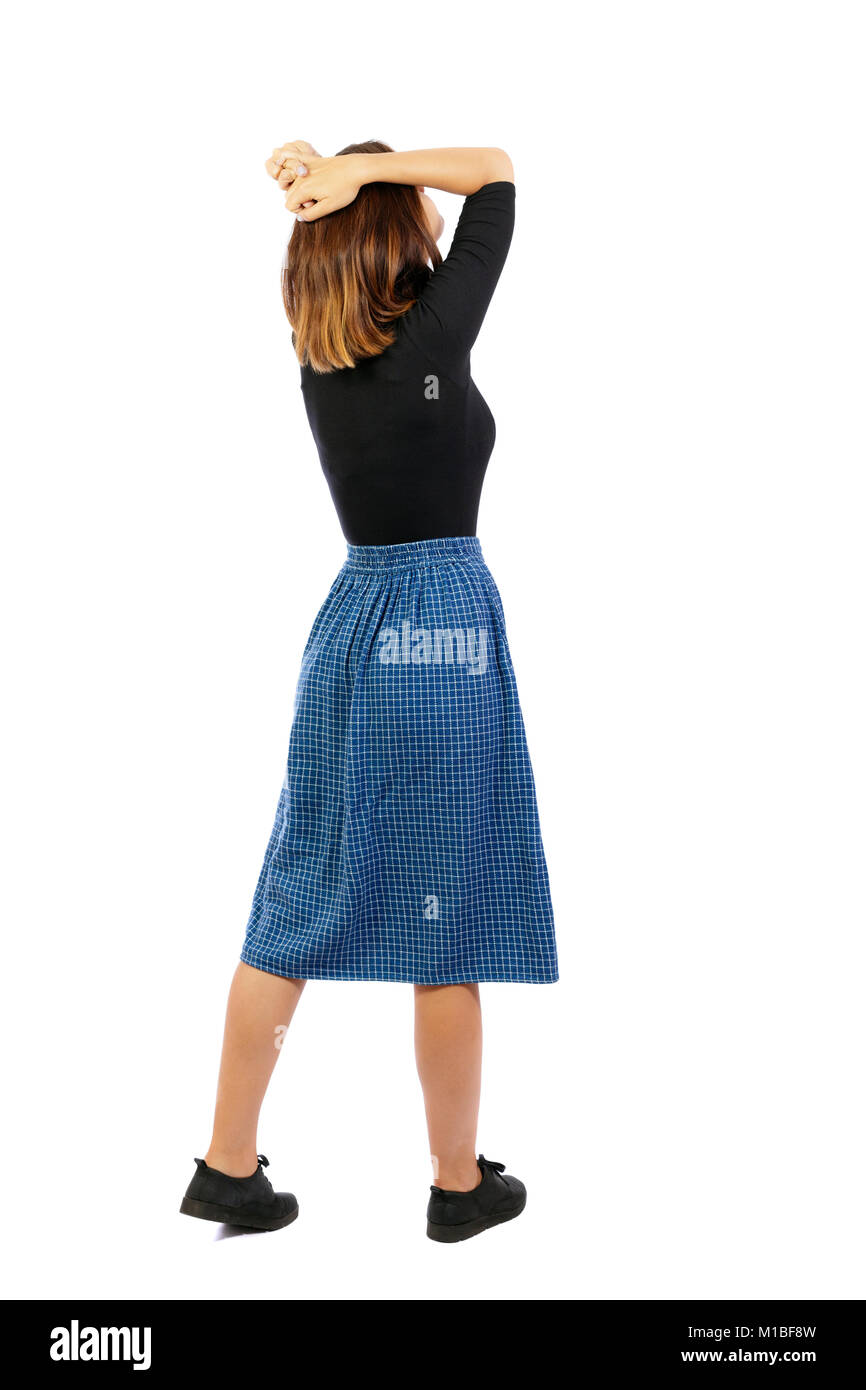 Back view of shocked woman in dress. upset young girl. Rear view people ...