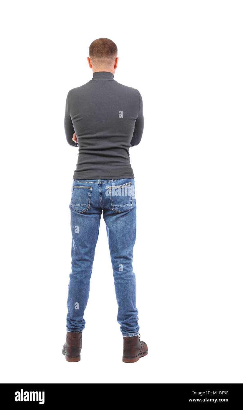 Back view of man in jeans. Standing young guy. Rear view people ...