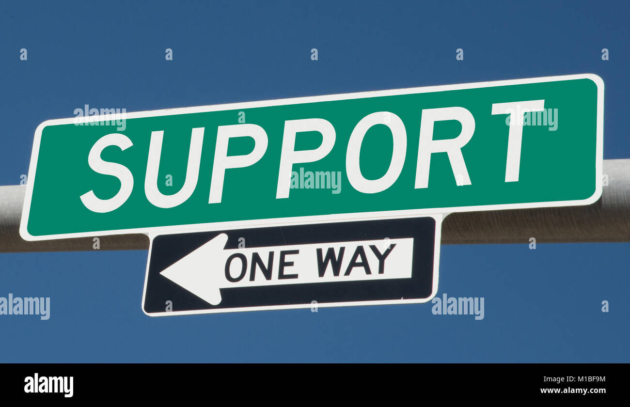 Support One Way green highway sign Stock Photo - Alamy