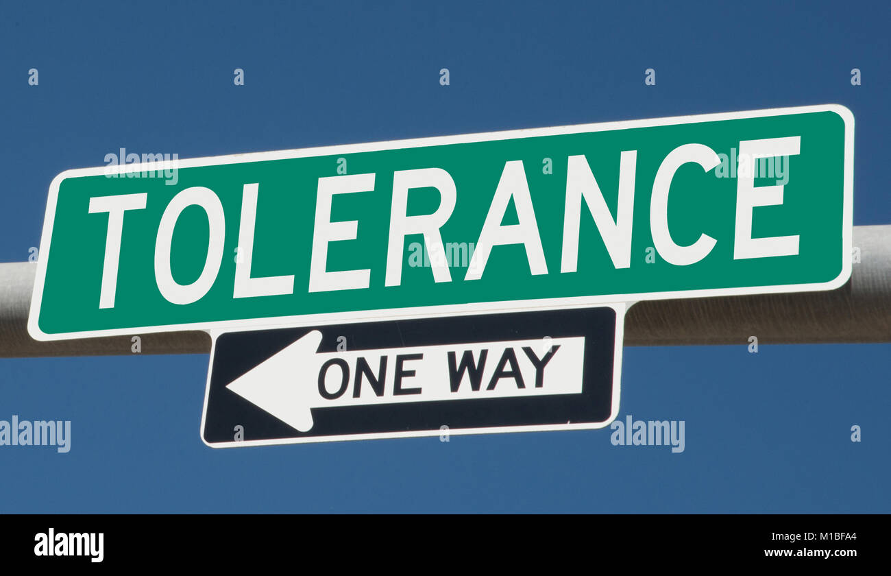 Tolerance One Way green highway sign Stock Photo - Alamy