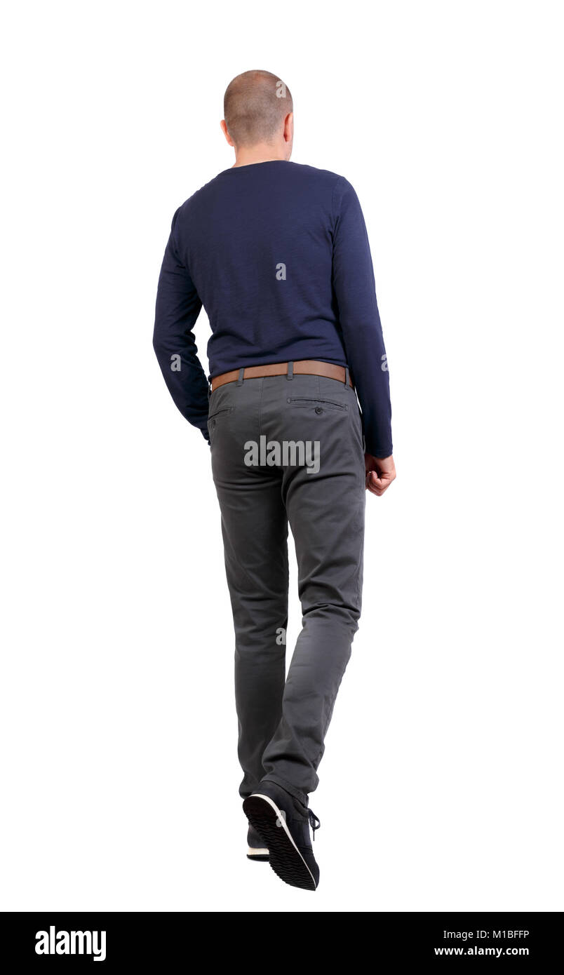Back view of going handsome man. walking young guy . Rear view people ...
