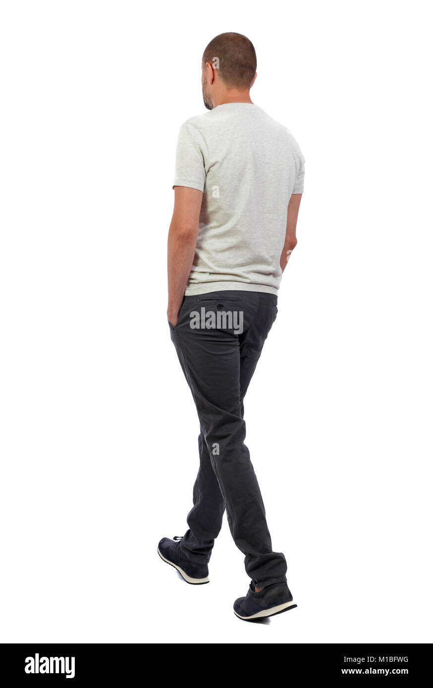 Back view of going handsome man. walking young guy . Rear view people ...