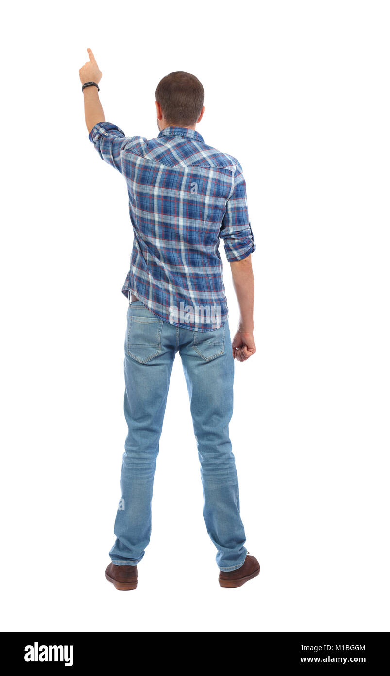 Back view of pointing young men in shirt and jeans. Young guy gesture ...